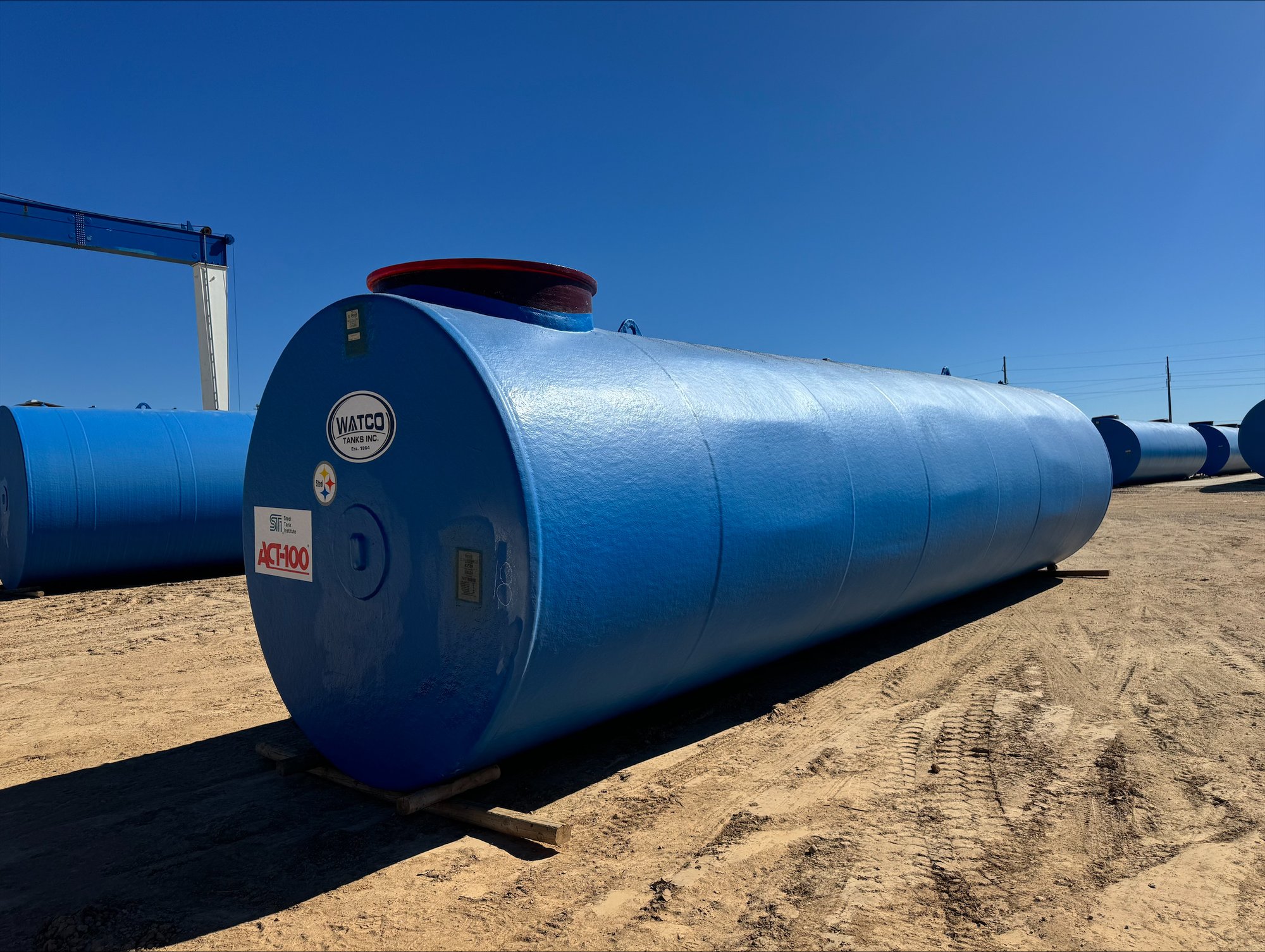 Act-100 – WATCO TANKS INC.